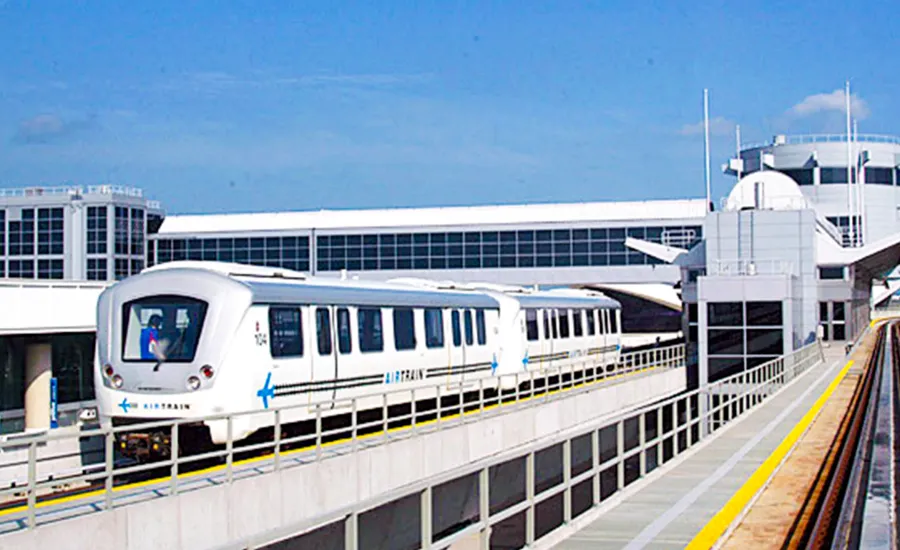 How do you travel on the JFK AirTrain at JFK Airport?